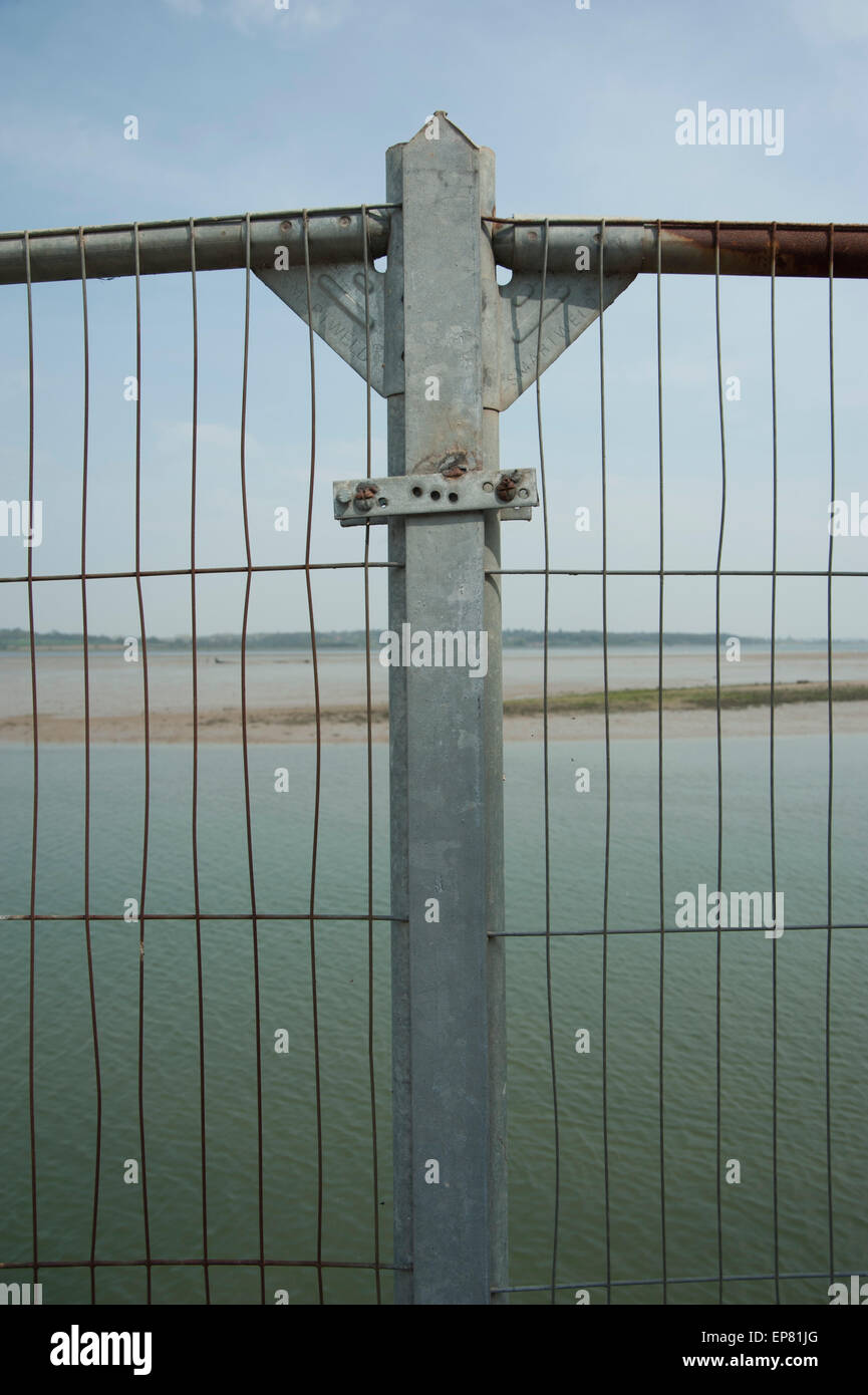 Fence erected along Mistley Quay Stock Photo - Alamy