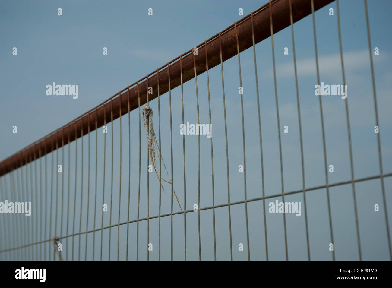 Fence erected along Mistley Quay Stock Photo - Alamy