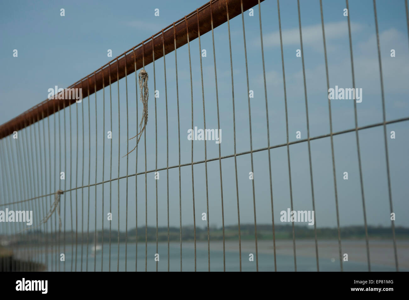 Fence erected along Mistley Quay Stock Photo - Alamy