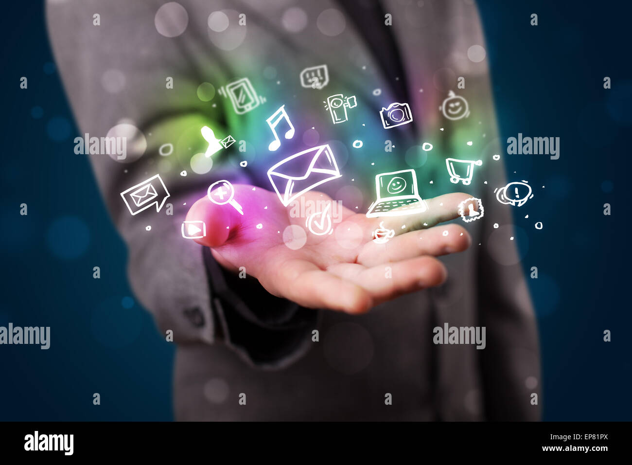 Young businessman presenting colorful glowing social media icons Stock ...