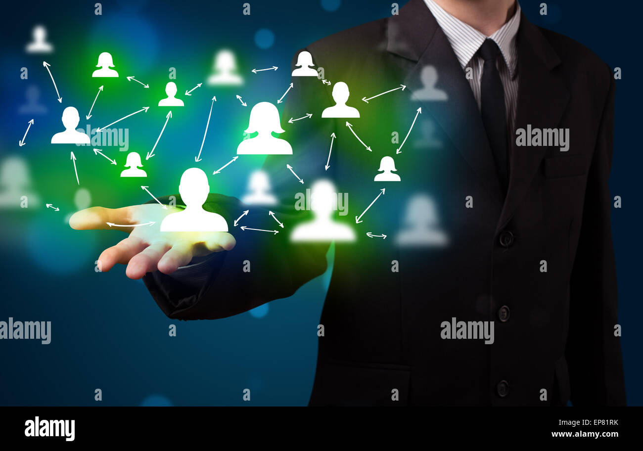 Young businessman presenting modern technology social network map Stock ...