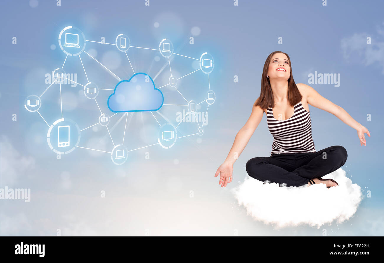 Happy woman sitting on cloud with cloud computing Stock Photo - Alamy