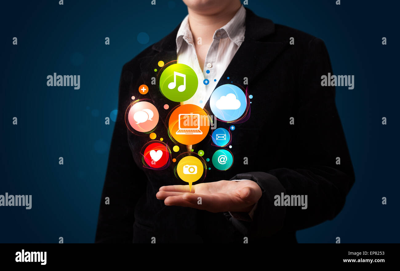 Young woman presenting colorful technology icons and symbols Stock ...