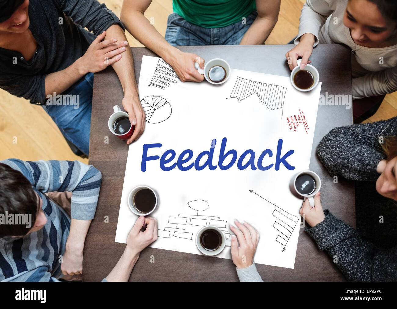 Feedback written on a poster with drawings of charts Stock Photo - Alamy