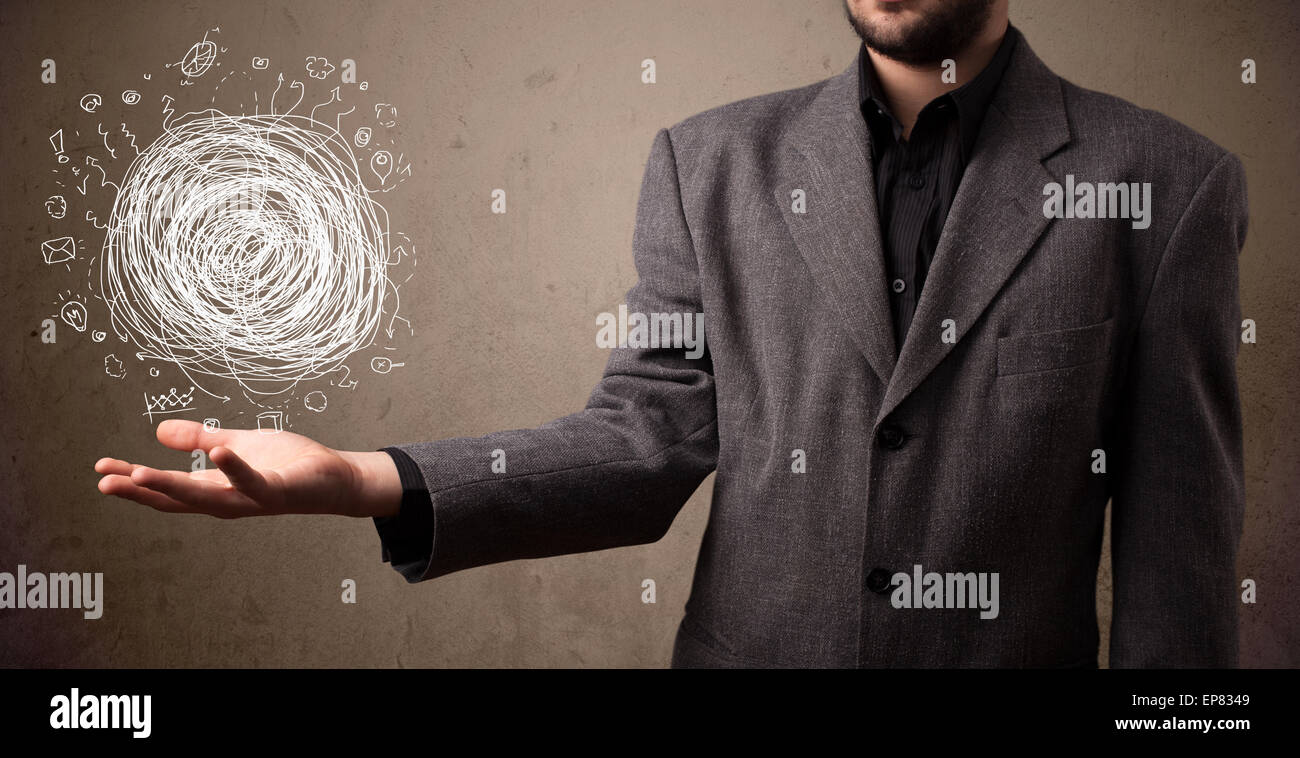 Chaos concept in the hand of a businessman Stock Photo - Alamy