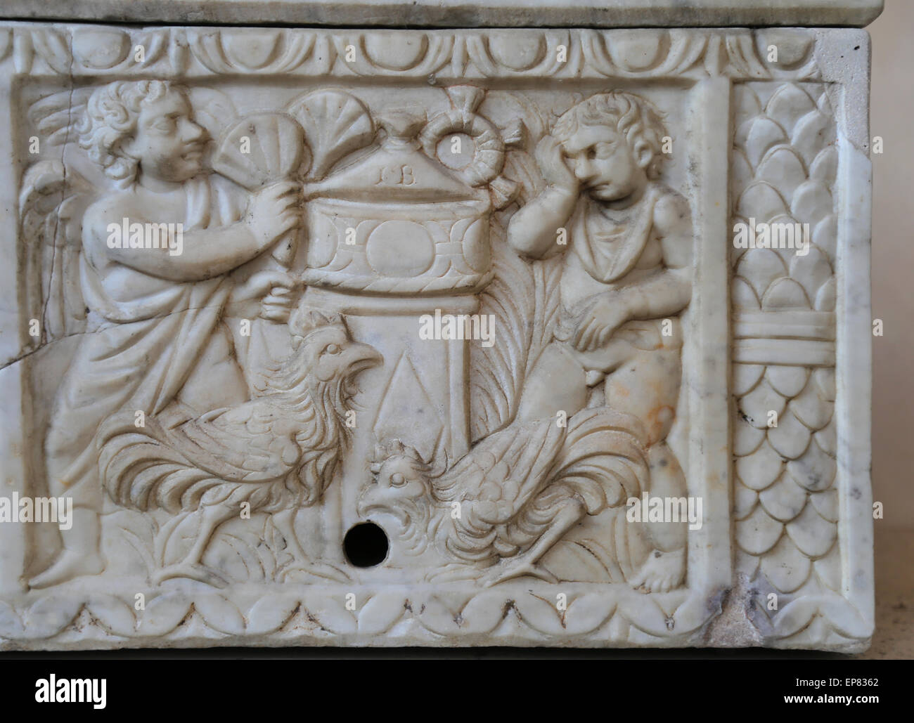 Sarcophagus with the figure of the deceased, cupids and fighting cocks ...