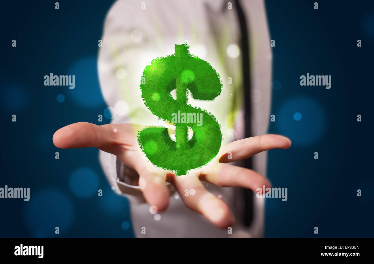 Young businessman presenting green glowing dollar sign Stock Photo - Alamy Young businessman presenting green glowing dollar sign Stock Photo - Alamy