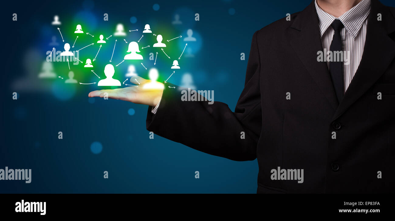 Young businessman presenting modern technology social network map Stock ...