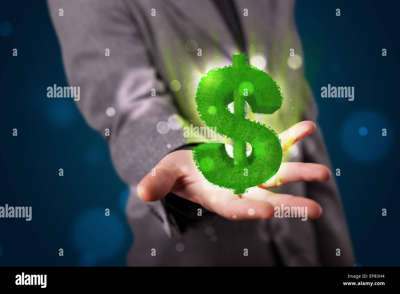 Young businessman presenting green glowing dollar sign Stock Photo - Alamy Young businessman presenting green glowing dollar sign Stock Photo - Alamy
