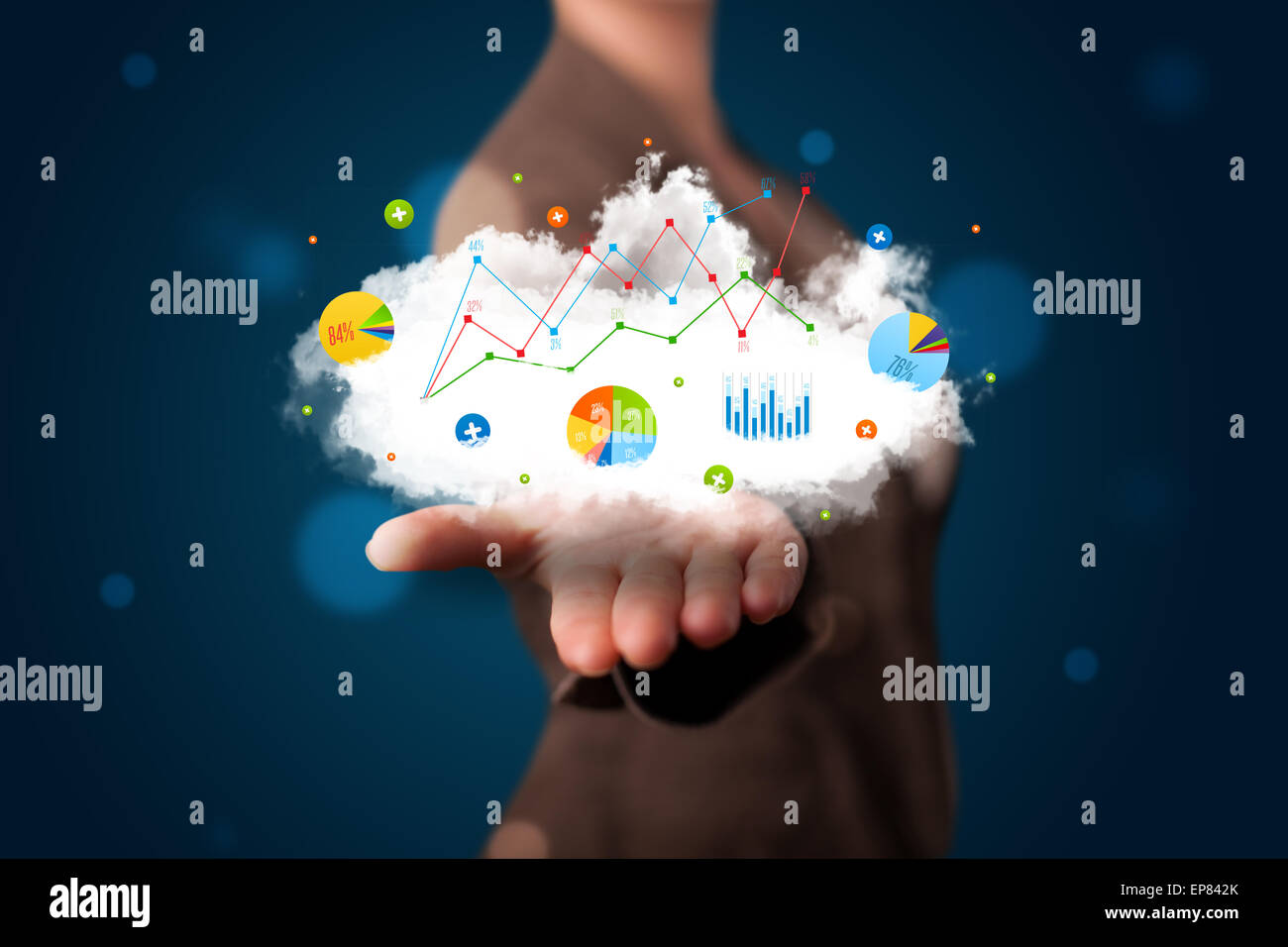 Young woman presenting cloud with charts and graph icons and symbols ...