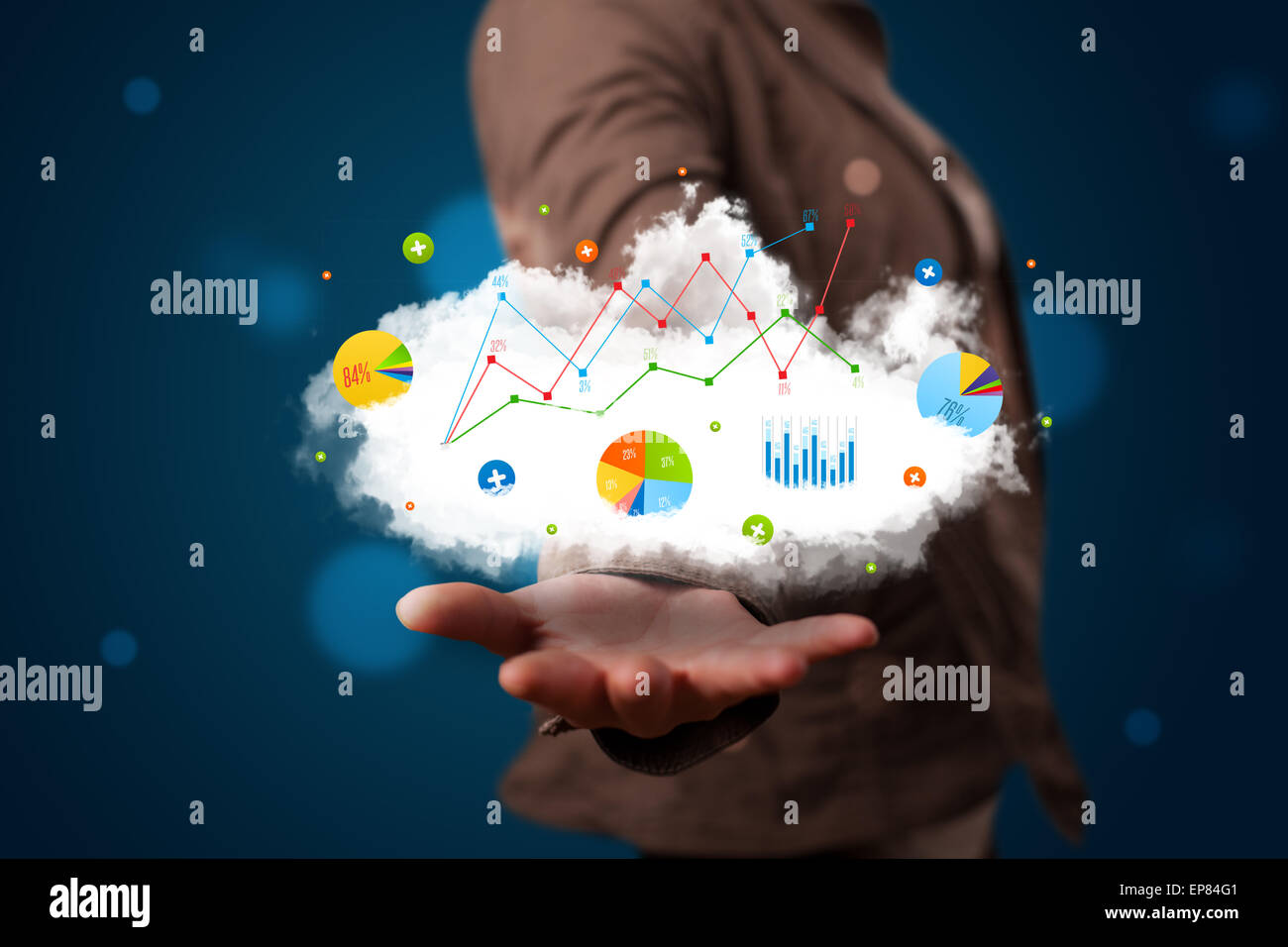 Young woman presenting cloud with charts and graph icons and symbols ...