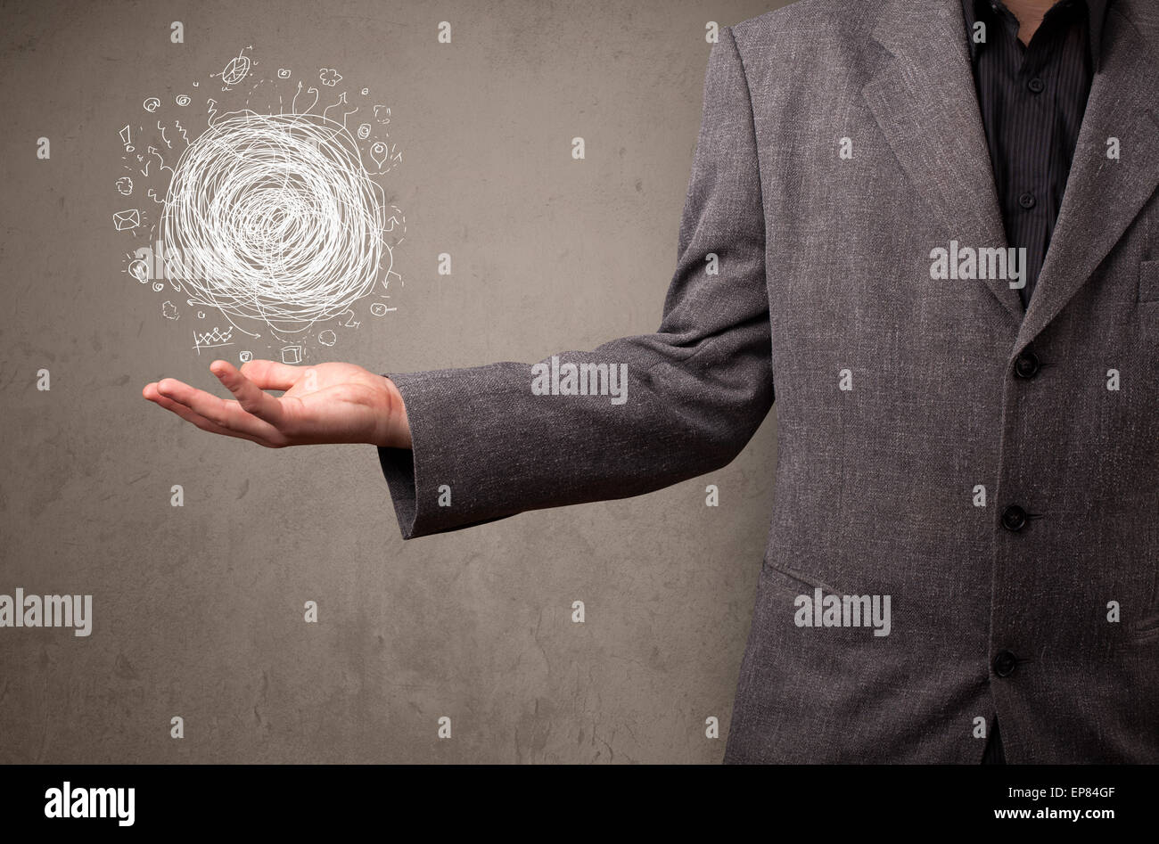 Chaos concept in the hand of a businessman Stock Photo - Alamy
