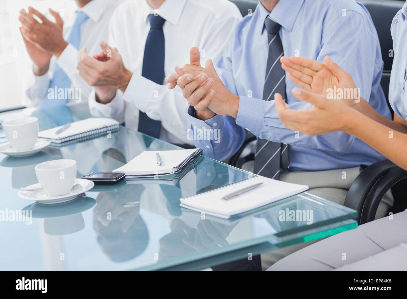 Group of business people applauding in the boardroom Stock Photo - Alamy