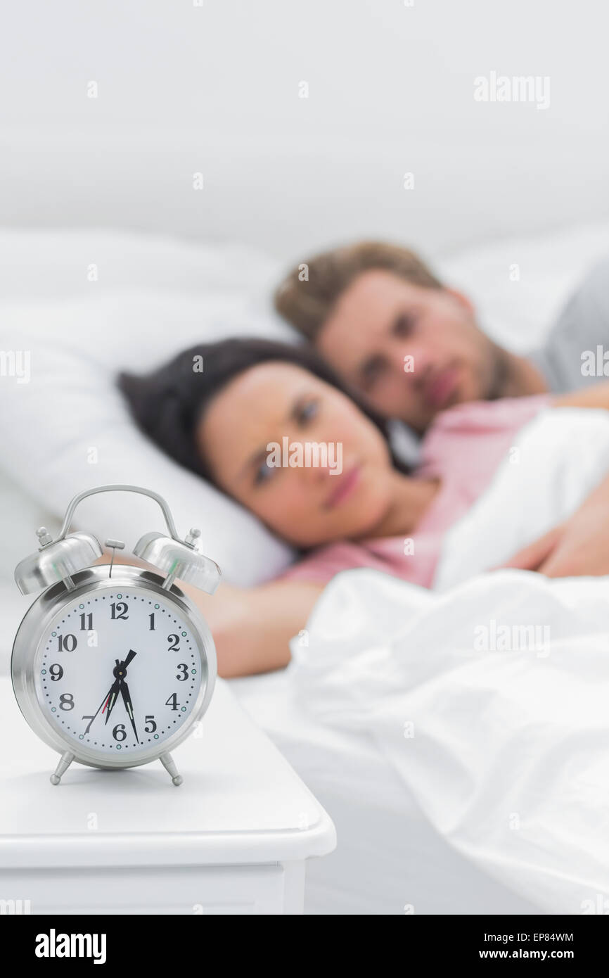 Couple spooning in bed hi-res stock photography and images - Alamy