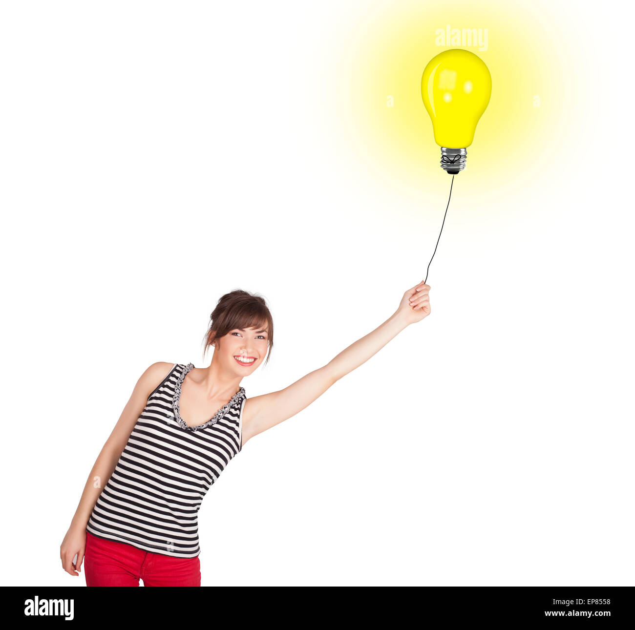 Happy woman holding a light bulb balloon Stock Photo - Alamy