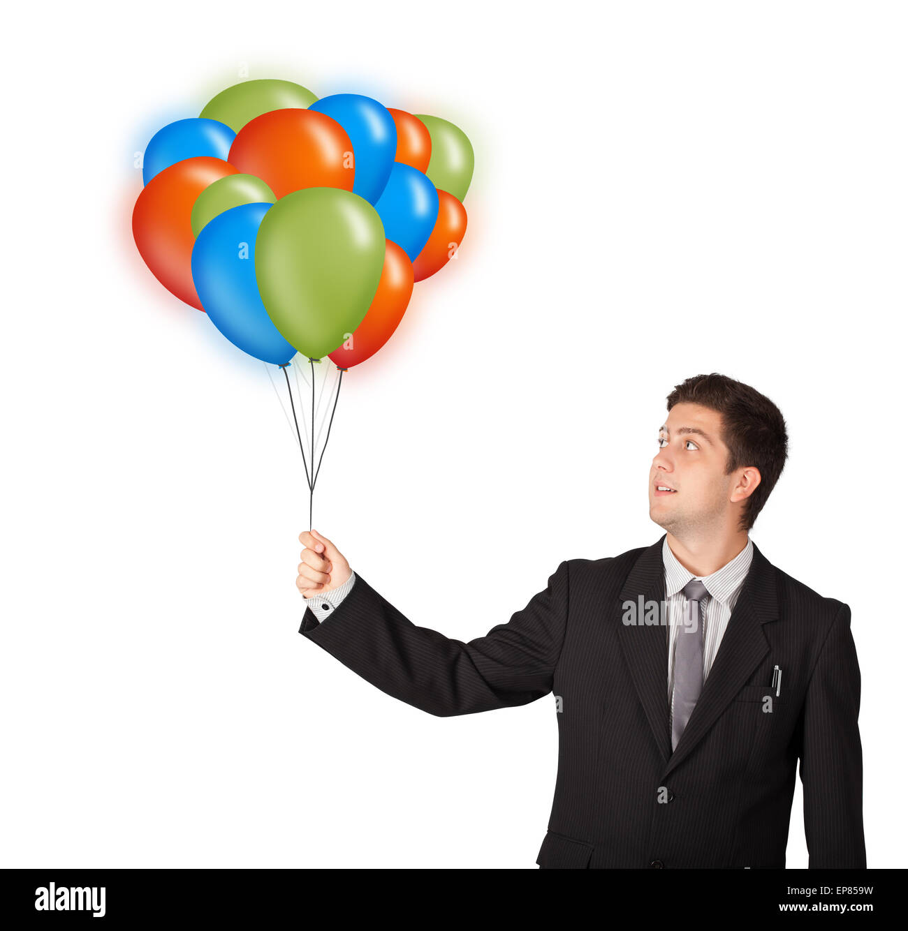 Handsome man holding colorful balloons Stock Photo - Alamy