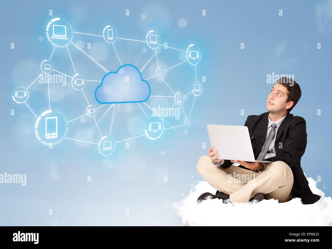 Happy businessman sitting on cloud with cloud computing Stock Photo - Alamy