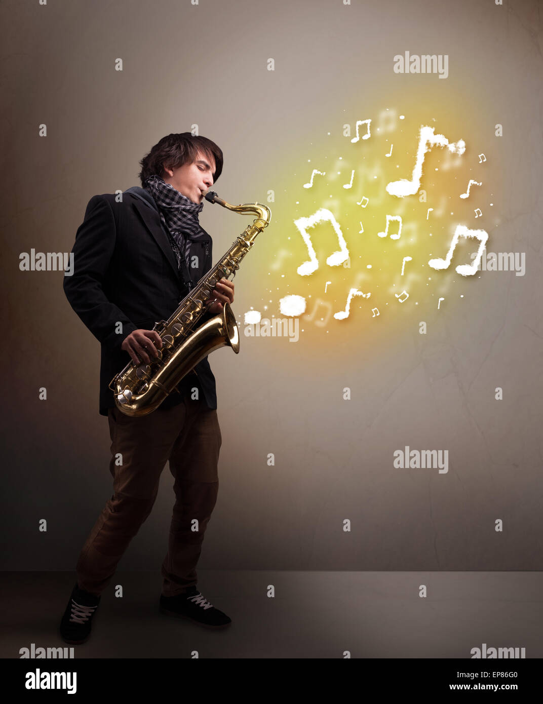 Handsome musician playing on saxophone with musical notes Stock Photo ...