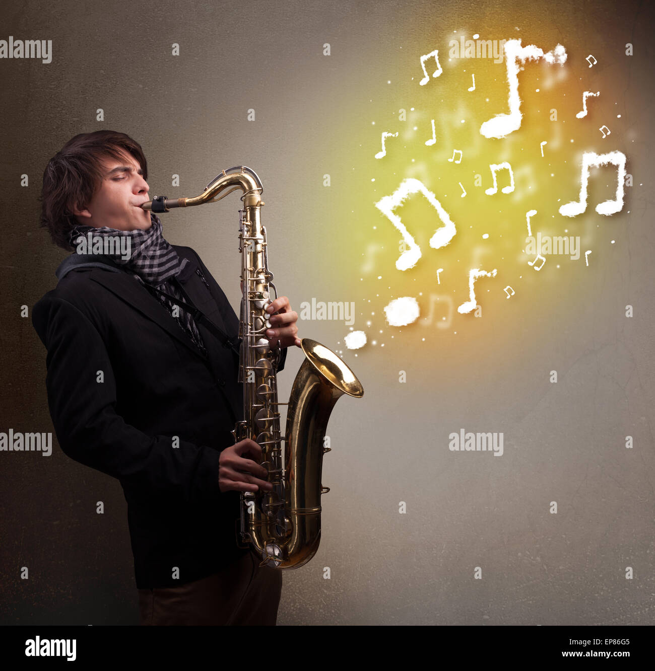 Handsome musician playing on saxophone with musical notes Stock Photo ...
