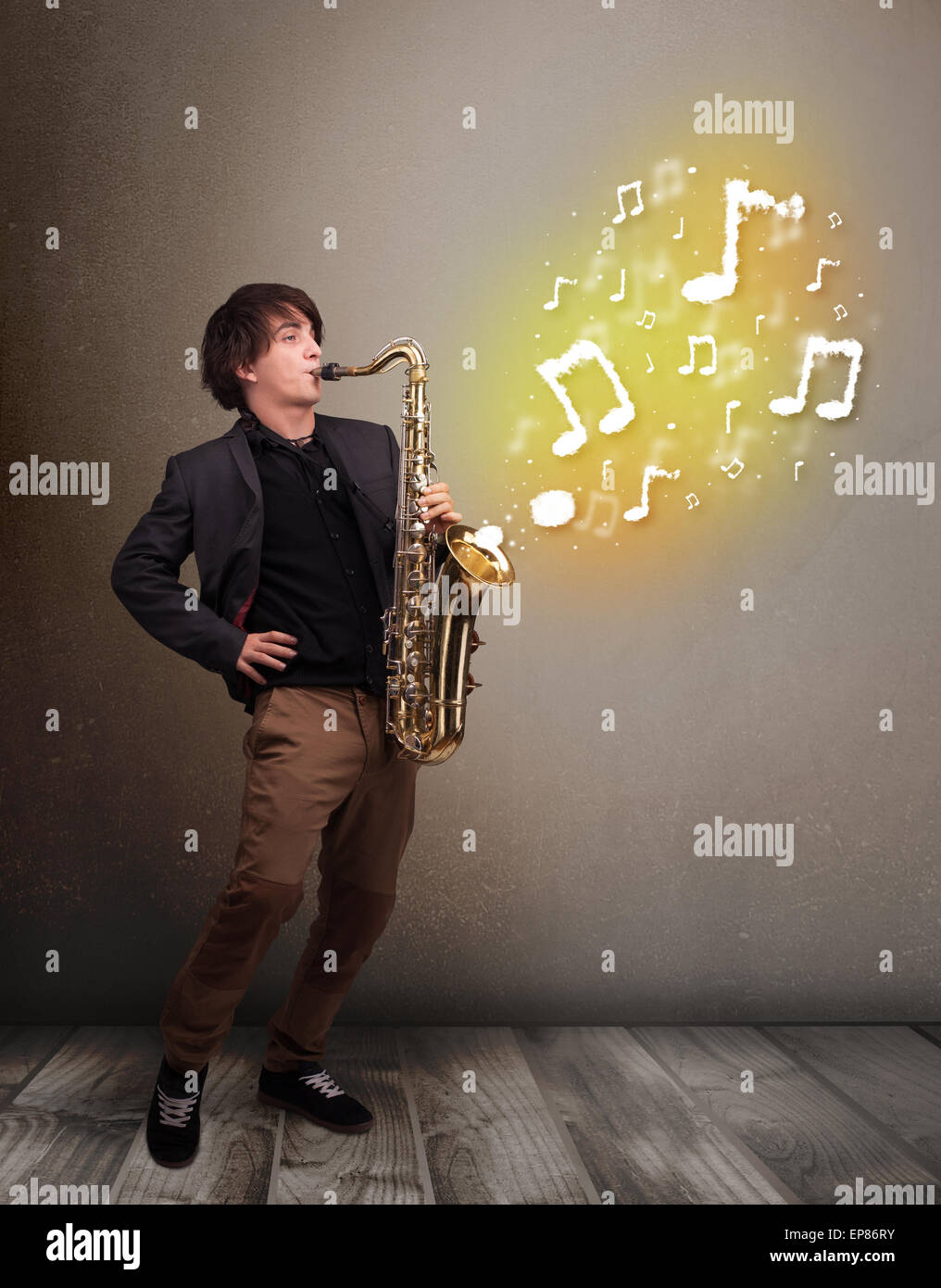 Handsome musician playing on saxophone with musical notes Stock Photo ...