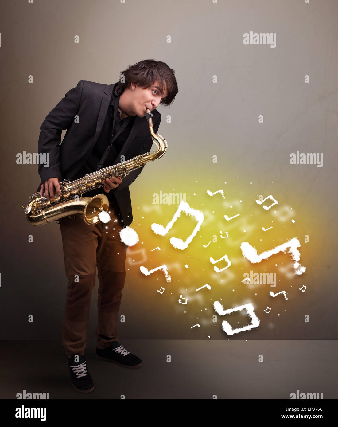 Boy playing a saxophone hi-res stock photography and images - Alamy