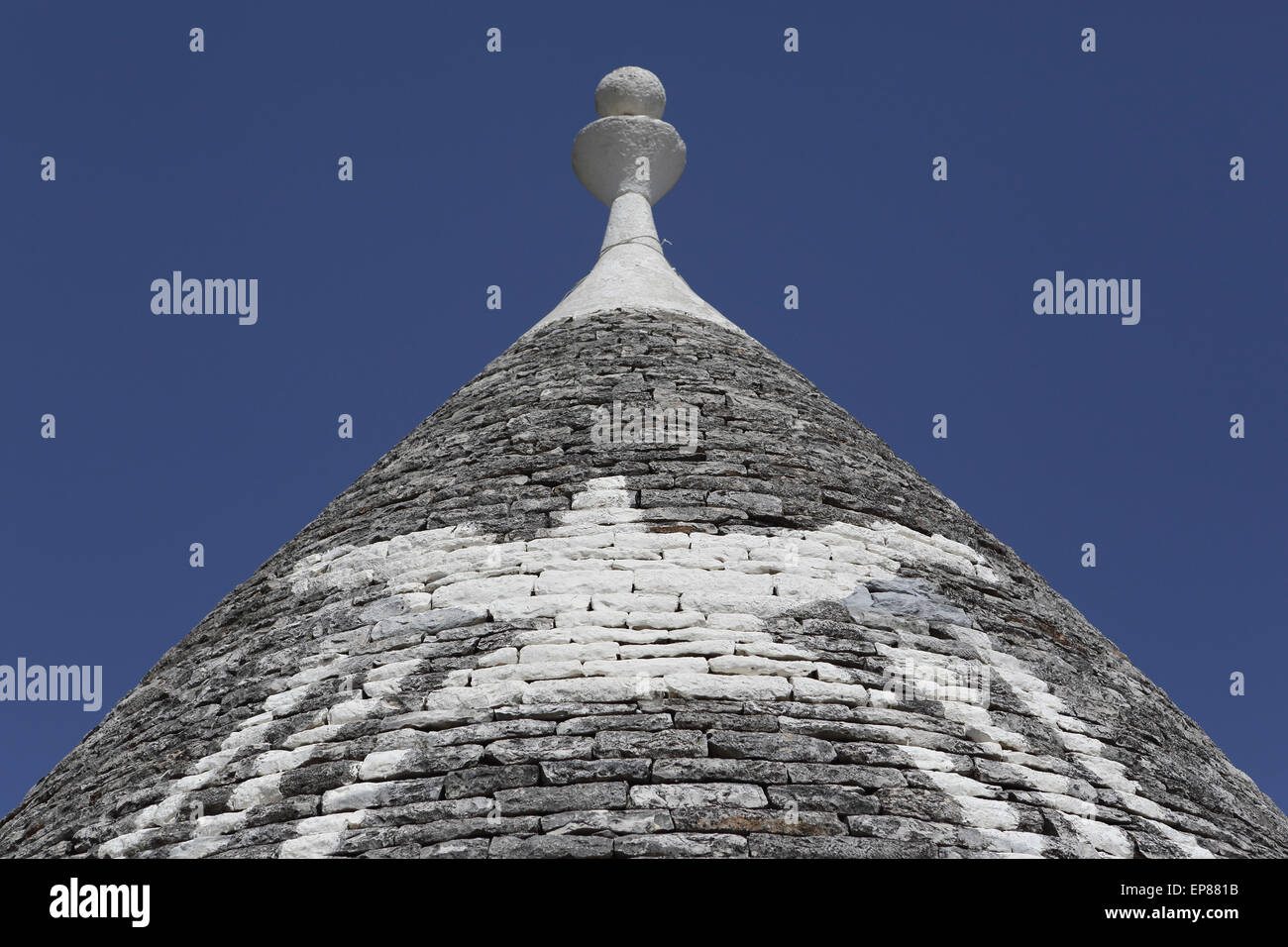 A roof of a trullo painted with a Christian symbol in the Rione Monte ...