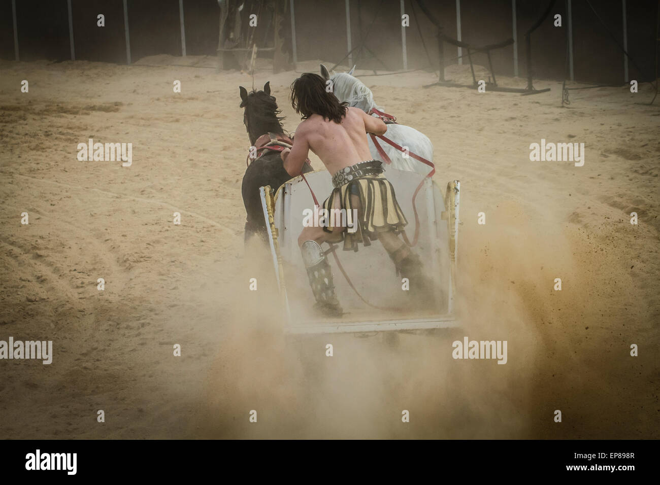 Empire, chariot race in a Roman circus, gladiators and slaves fighting ...