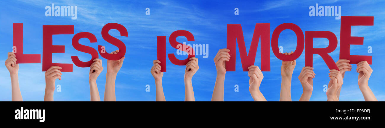 People Hands Hold Red Word Less Is More Blue Sky Stock Photo - Alamy