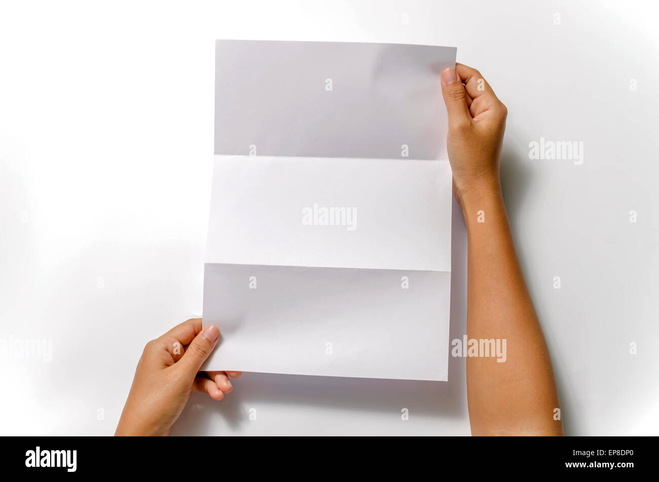 woman two hands holding blank paper a4 size on a white background Stock ...