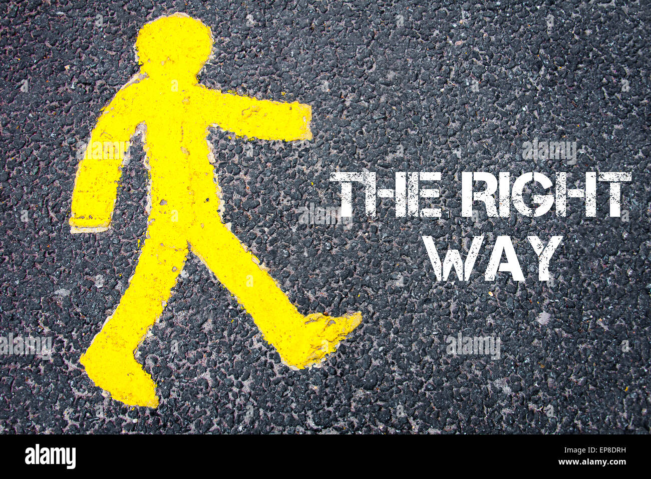 Yellow pedestrian figure on the road walking towards THE RIGHT WAY ...
