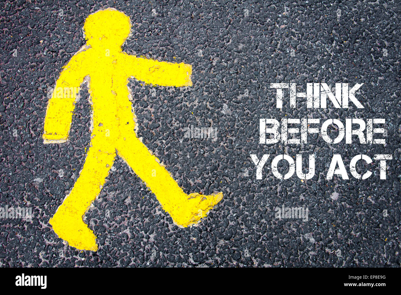 Yellow pedestrian figure on the road walking towards THINK BEFORE YOU ...