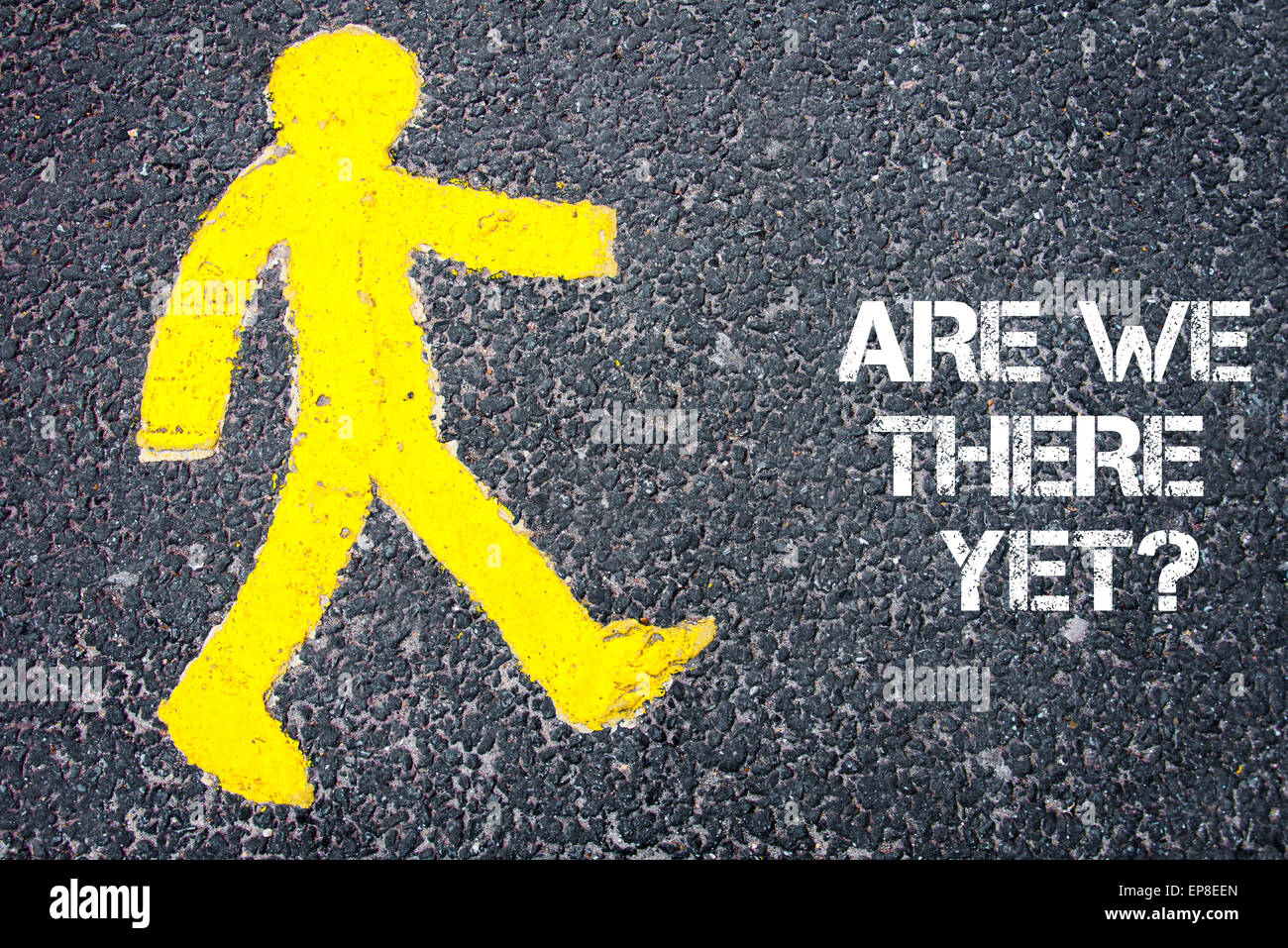 Yellow pedestrian figure on the road walking towards Are We There Yet ...