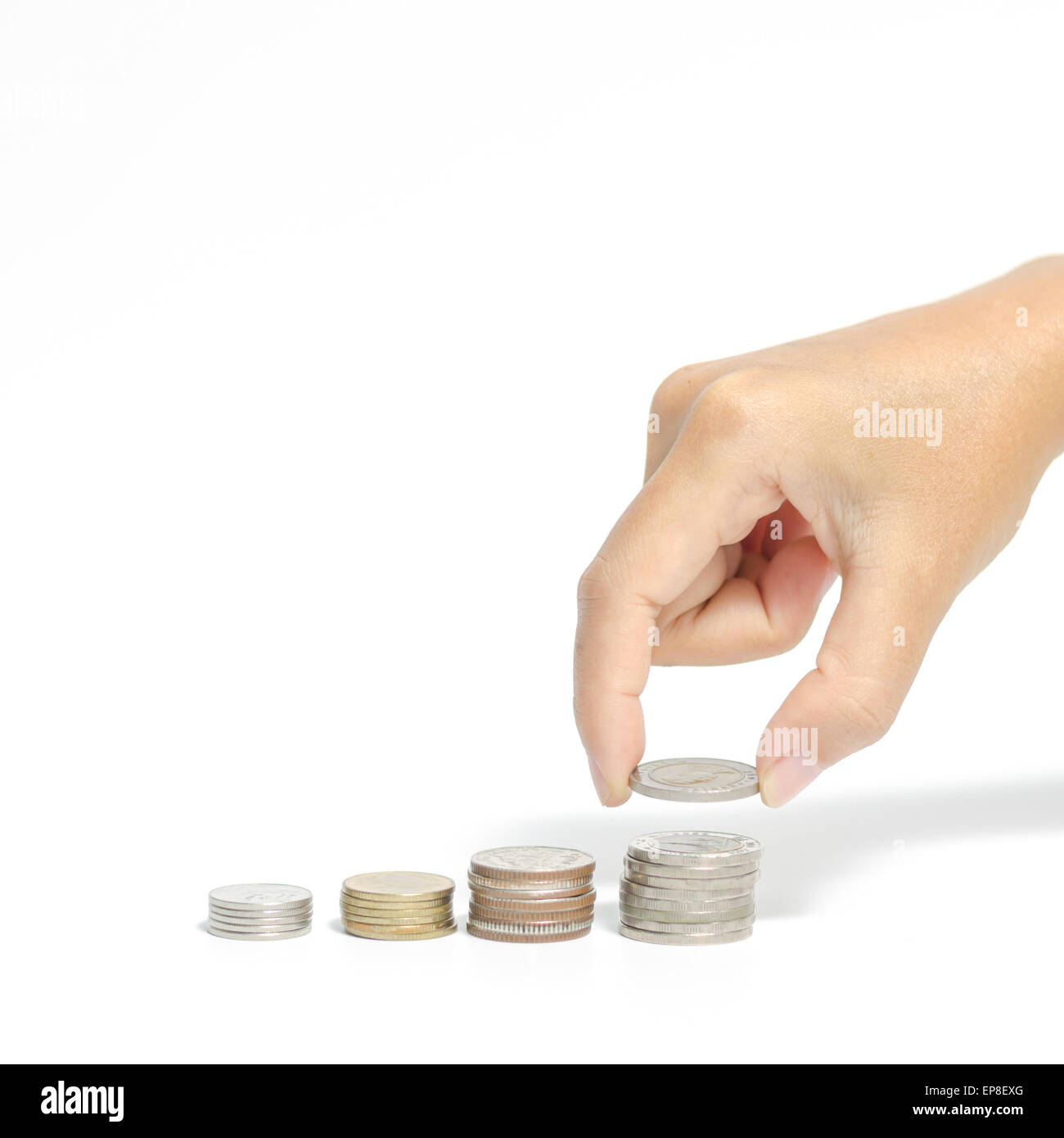 Hand holding gold coins hi-res stock photography and images - Alamy