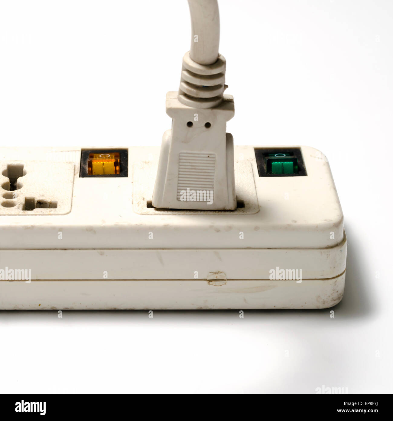 electric multiple socket outlet on a white background Stock Photo - Alamy