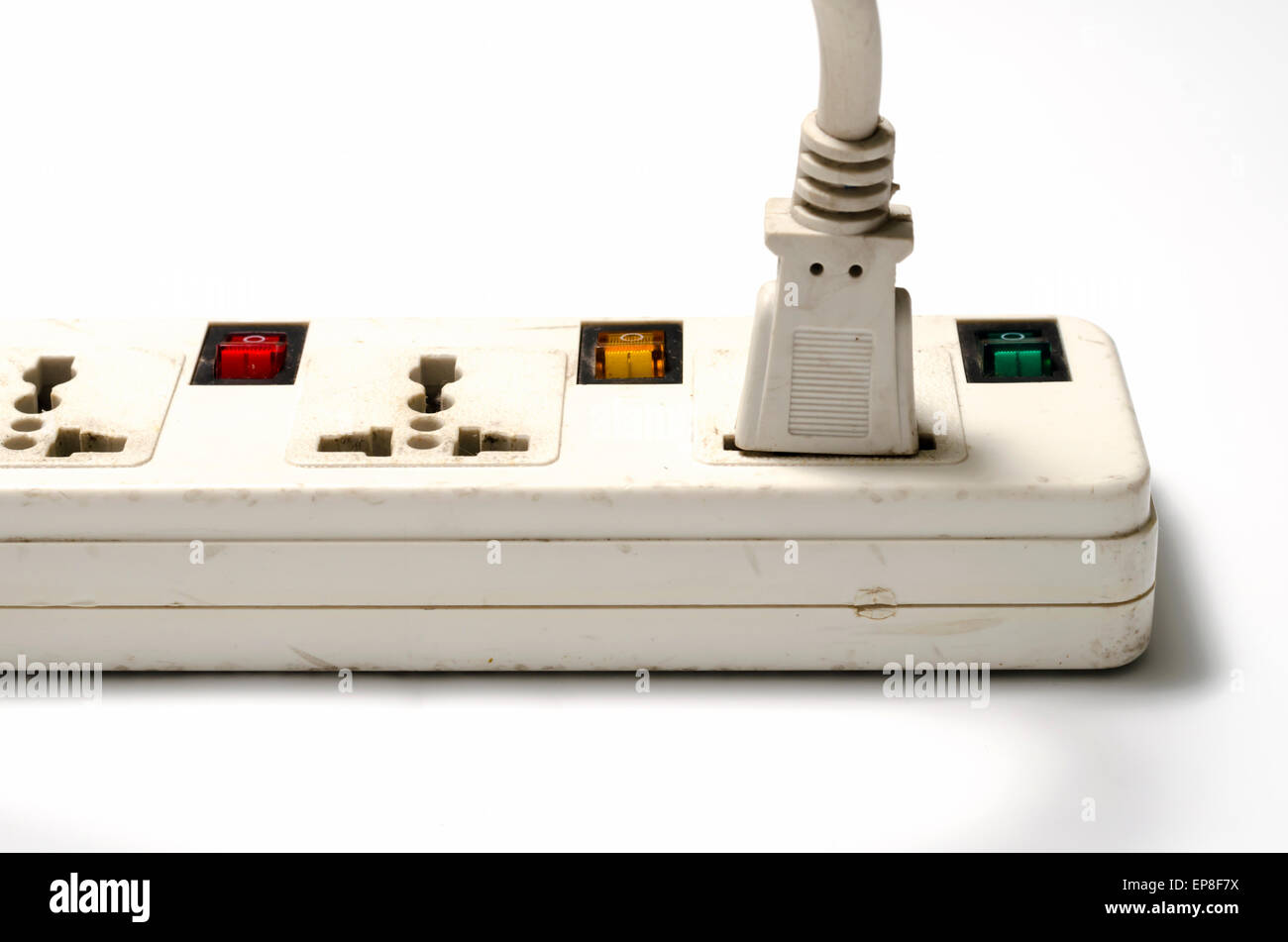 electric multiple socket outlet on a white background Stock Photo - Alamy