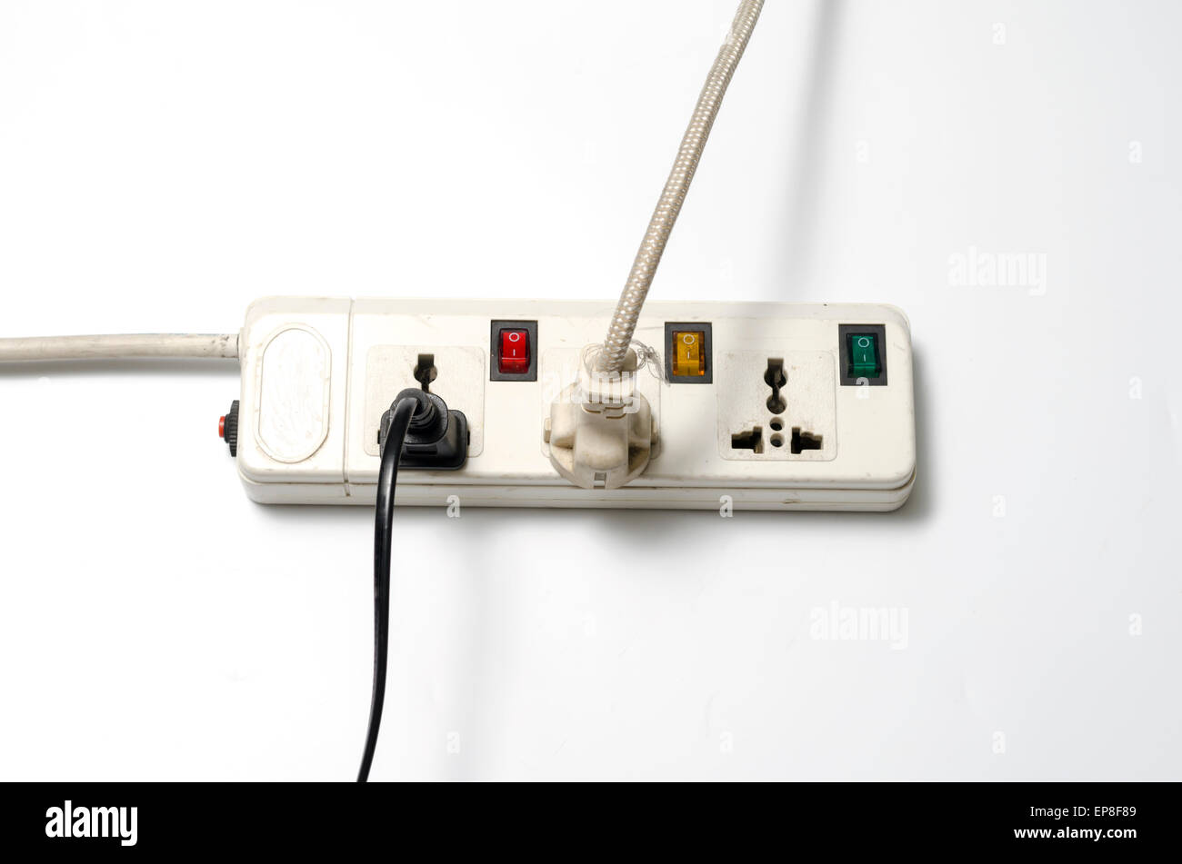 electric multiple socket outlet on a white background Stock Photo - Alamy
