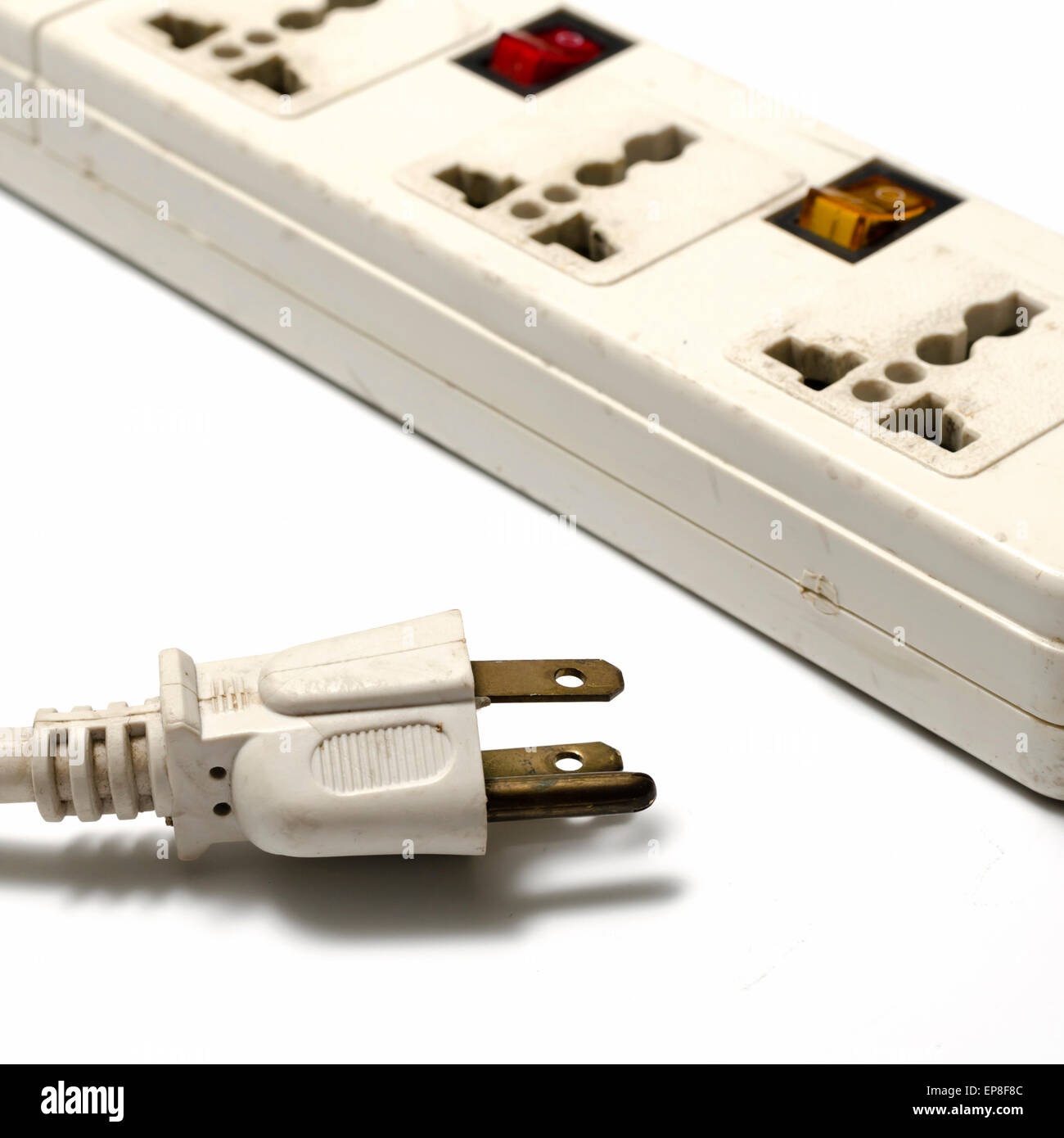 electric multiple socket outlet on a white background Stock Photo - Alamy