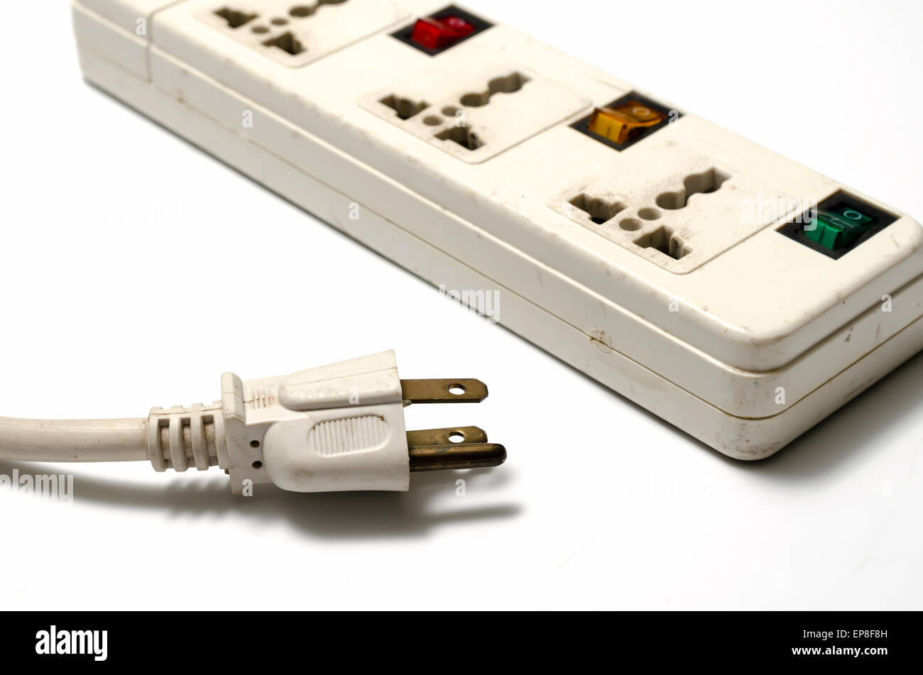 electric multiple socket outlet on a white background Stock Photo - Alamy