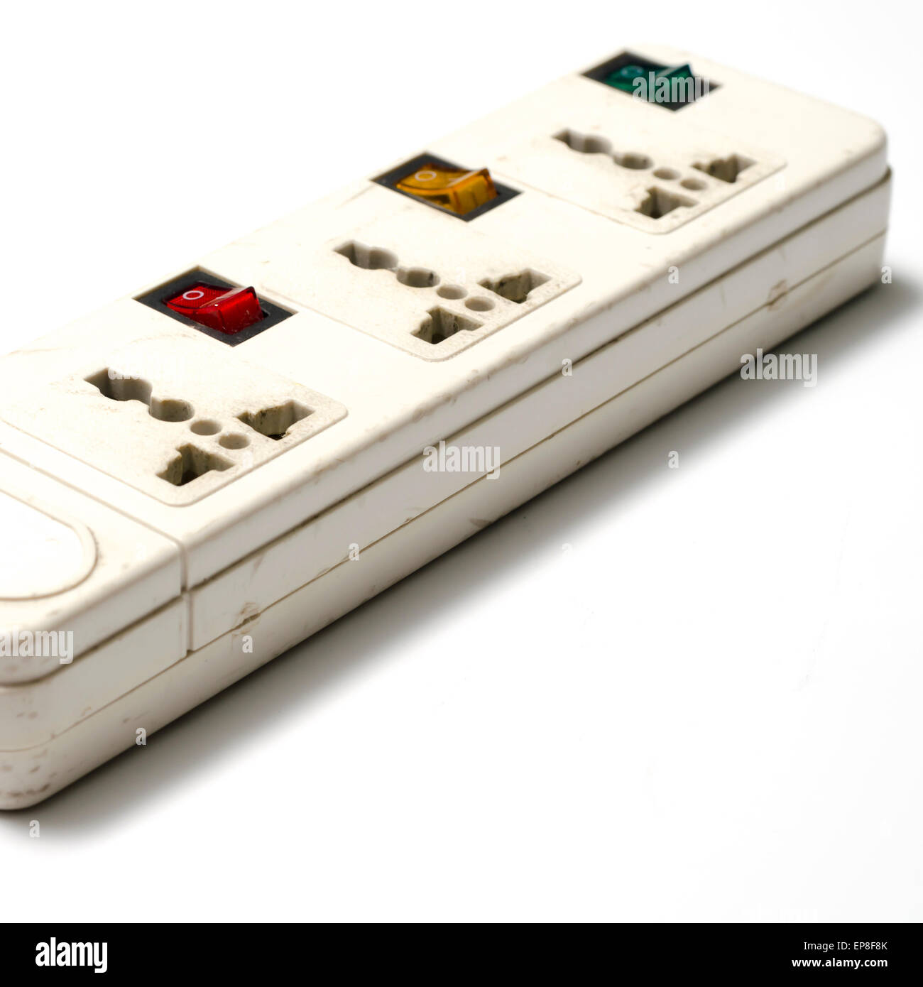 electric multiple socket outlet on a white background Stock Photo - Alamy
