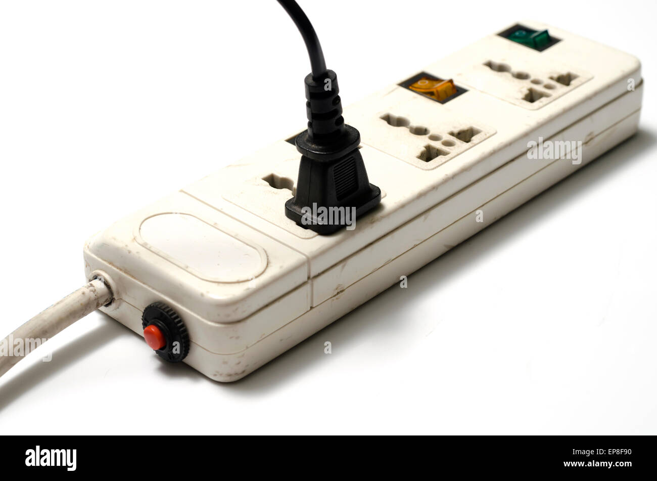 electric multiple socket outlet on a white background Stock Photo - Alamy