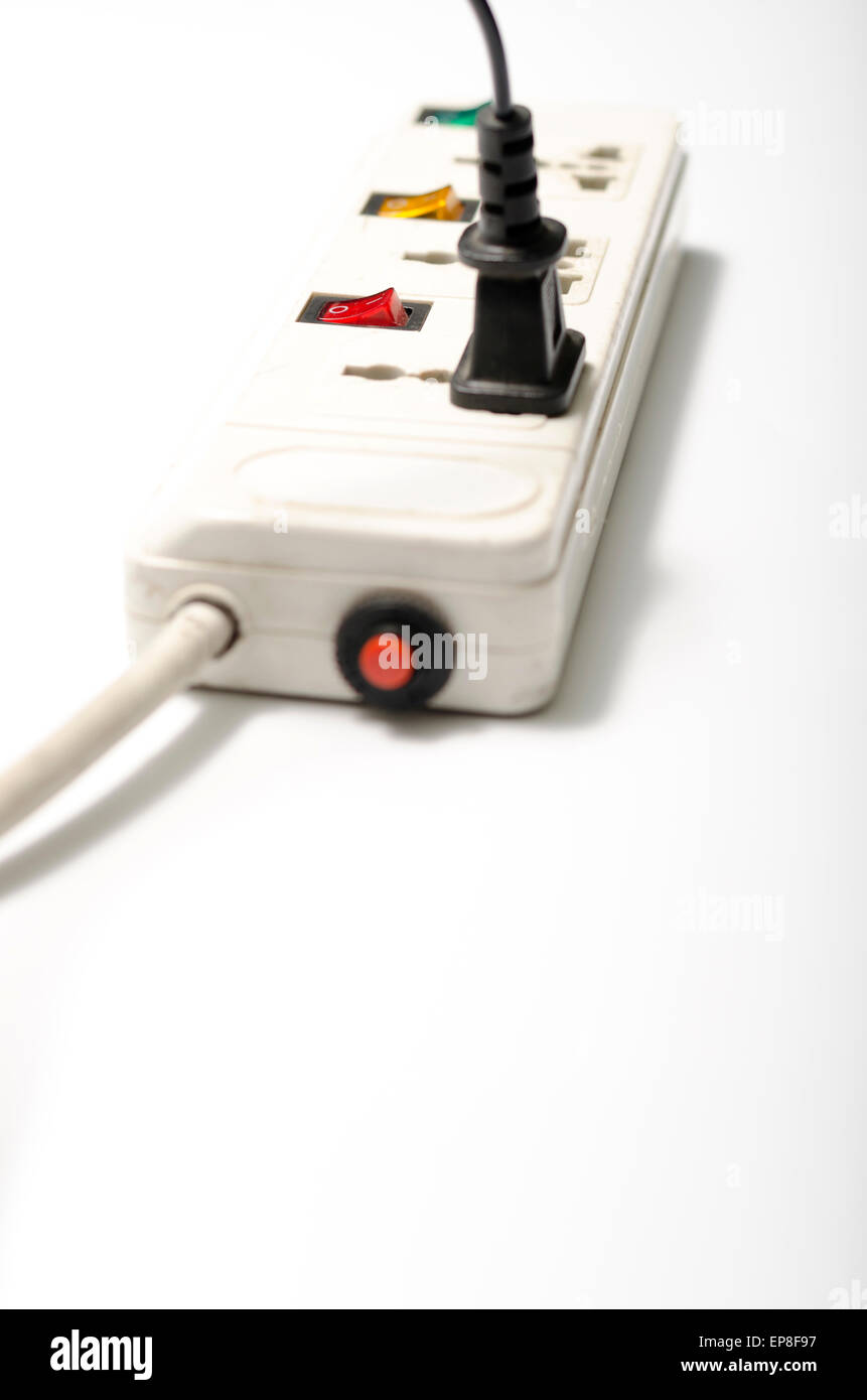 electric multiple socket outlet on a white background Stock Photo - Alamy