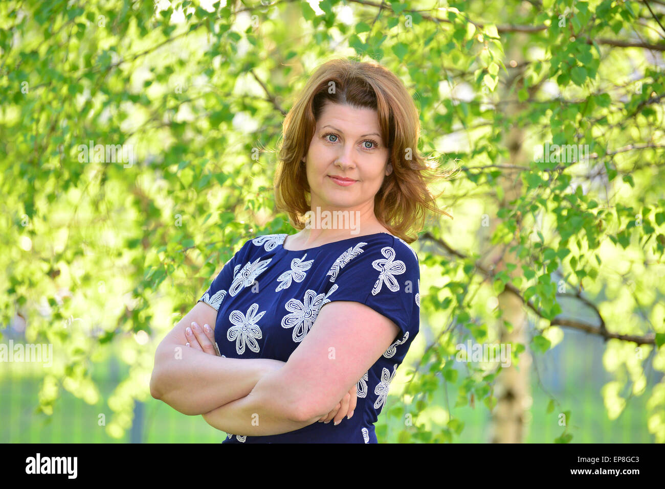 adult elegant woman on the nature in the summer Stock Photo - Alamy
