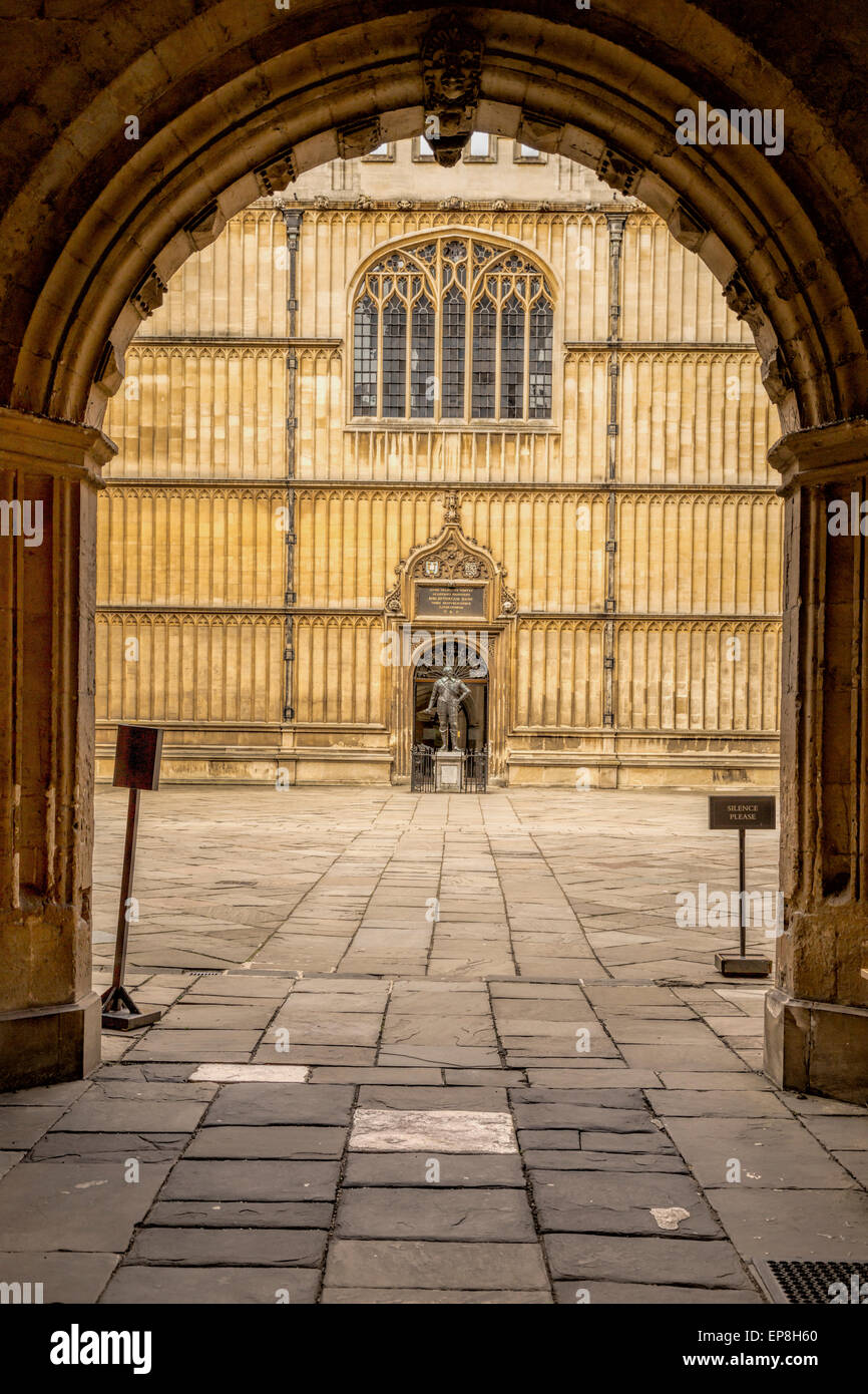 Courtyard of the Bodleian Library and the statue of Sir Thomas Bodley ...