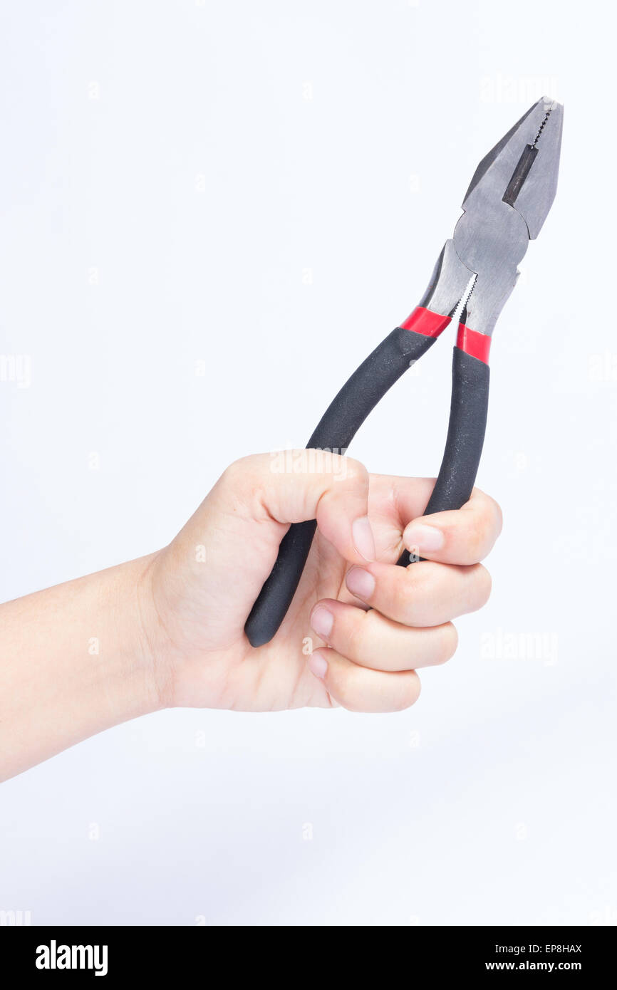 Pliers in hand isolated on white Stock Photo - Alamy