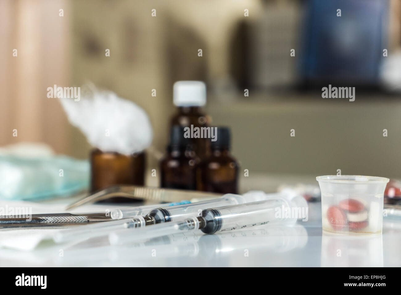 Drugs in a measuring cylinder Stock Photo - Alamy