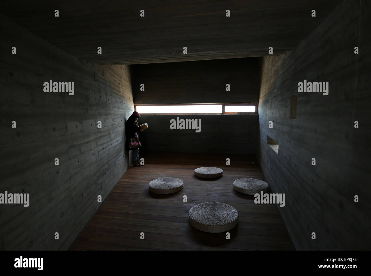 Qinhuangdao, China's Hebei Province. 14th May, 2015. A reader is seen ...