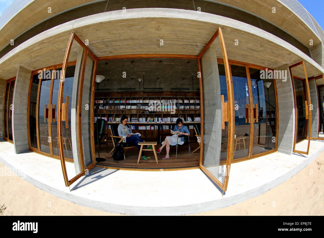 Qinhuangdao, China's Hebei Province. 14th May, 2015. People read books ...