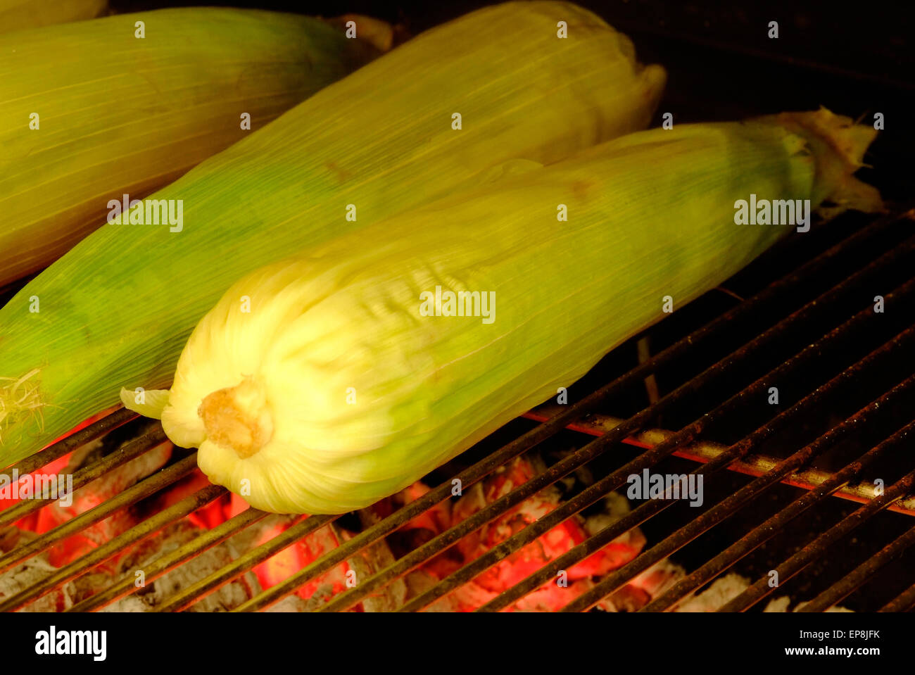 Mielies or corn on the cob is often cooked on open fire in South Africa ...
