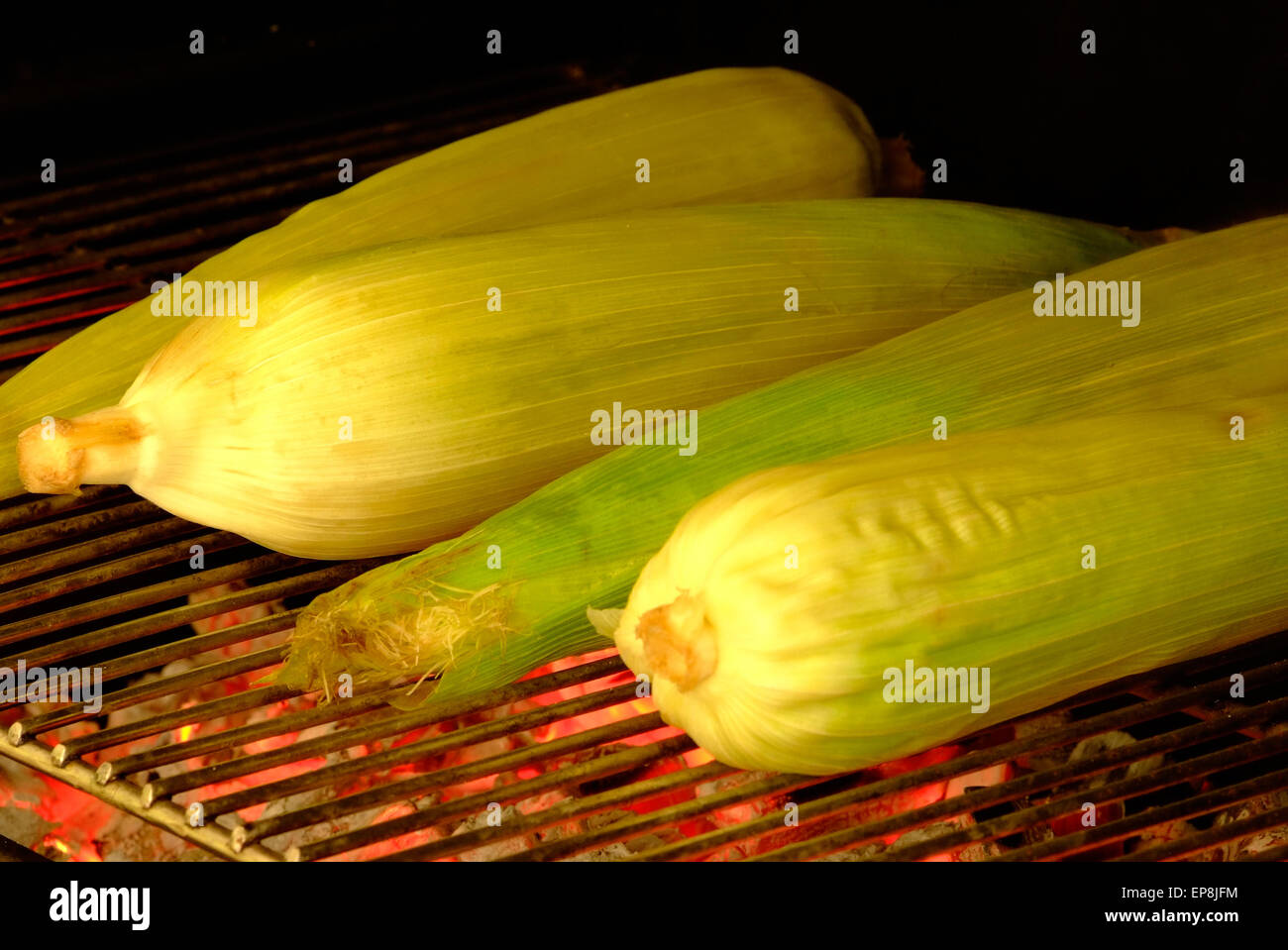 Mielies or corn on the cob is often cooked on open fire in South Africa ...