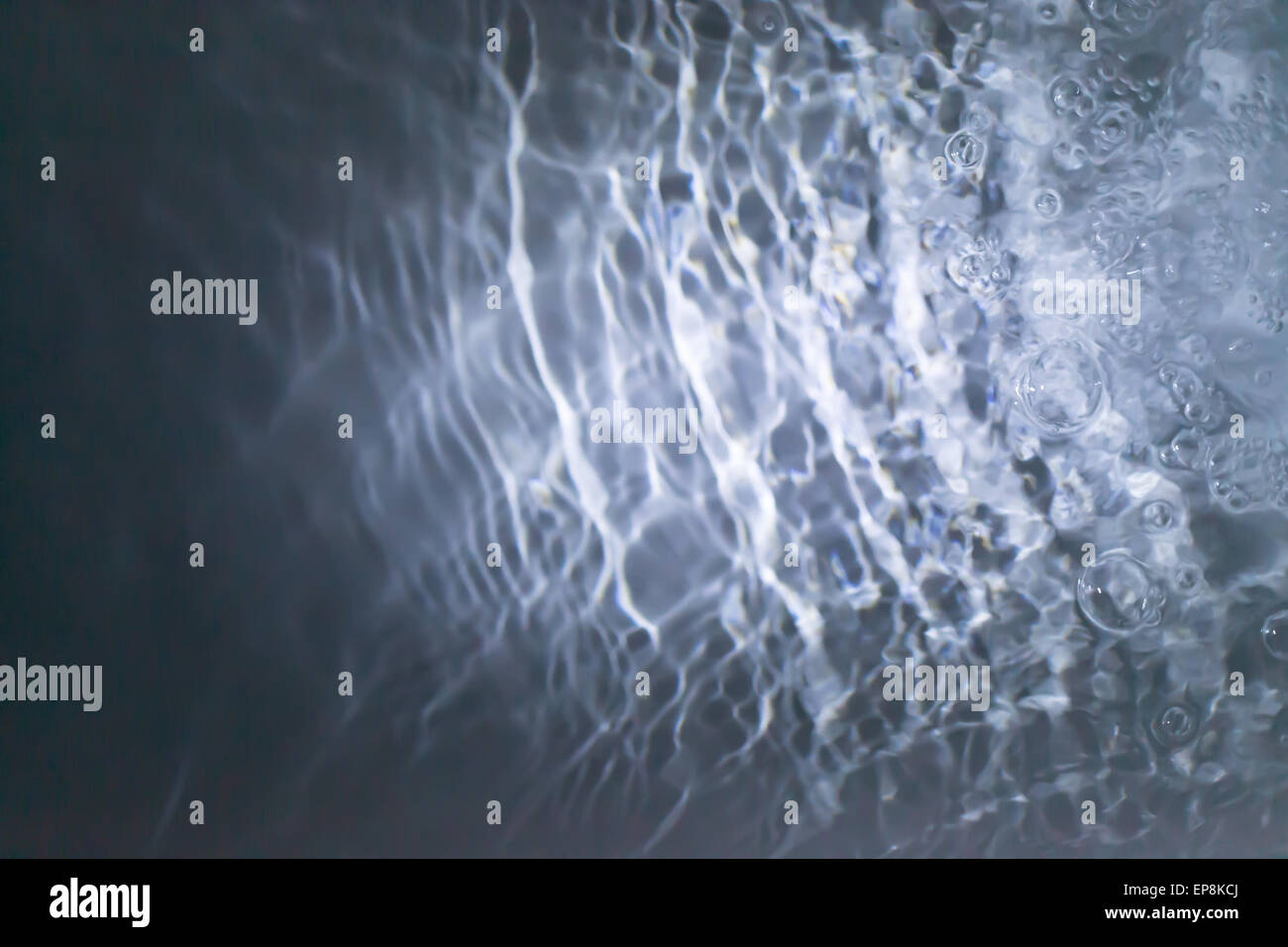 Ripples and shadow on the surface of bath water Stock Photo - Alamy